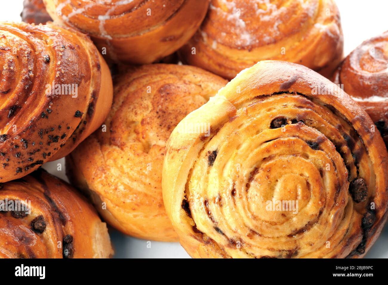 Sweet tasty buns, close up Stock Photo - Alamy