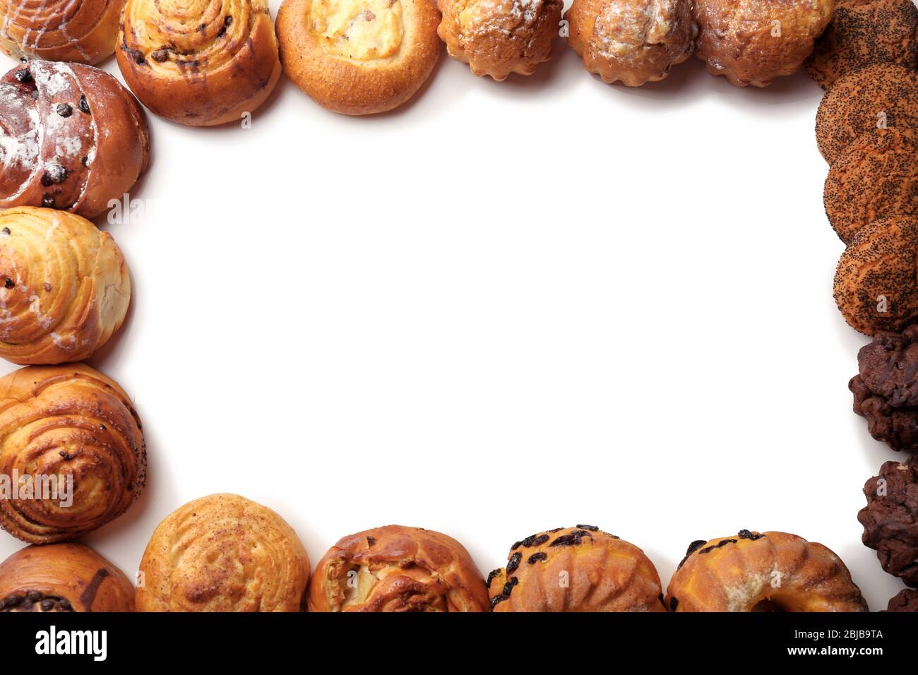 Frame of assorted fresh pastries on white background Stock Photo - Alamy