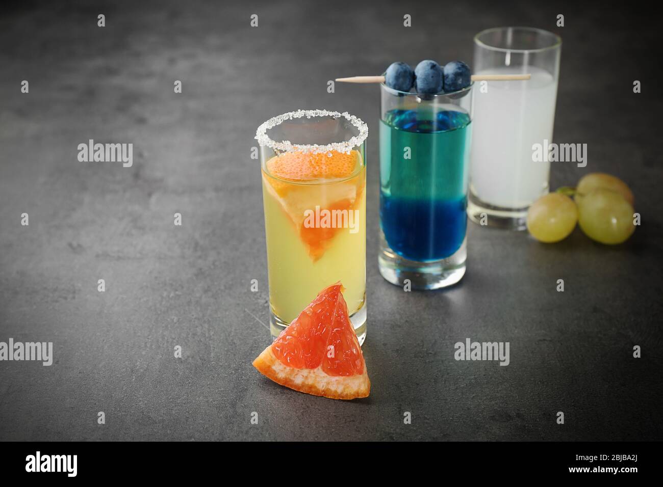 Different shots on gray background Stock Photo - Alamy