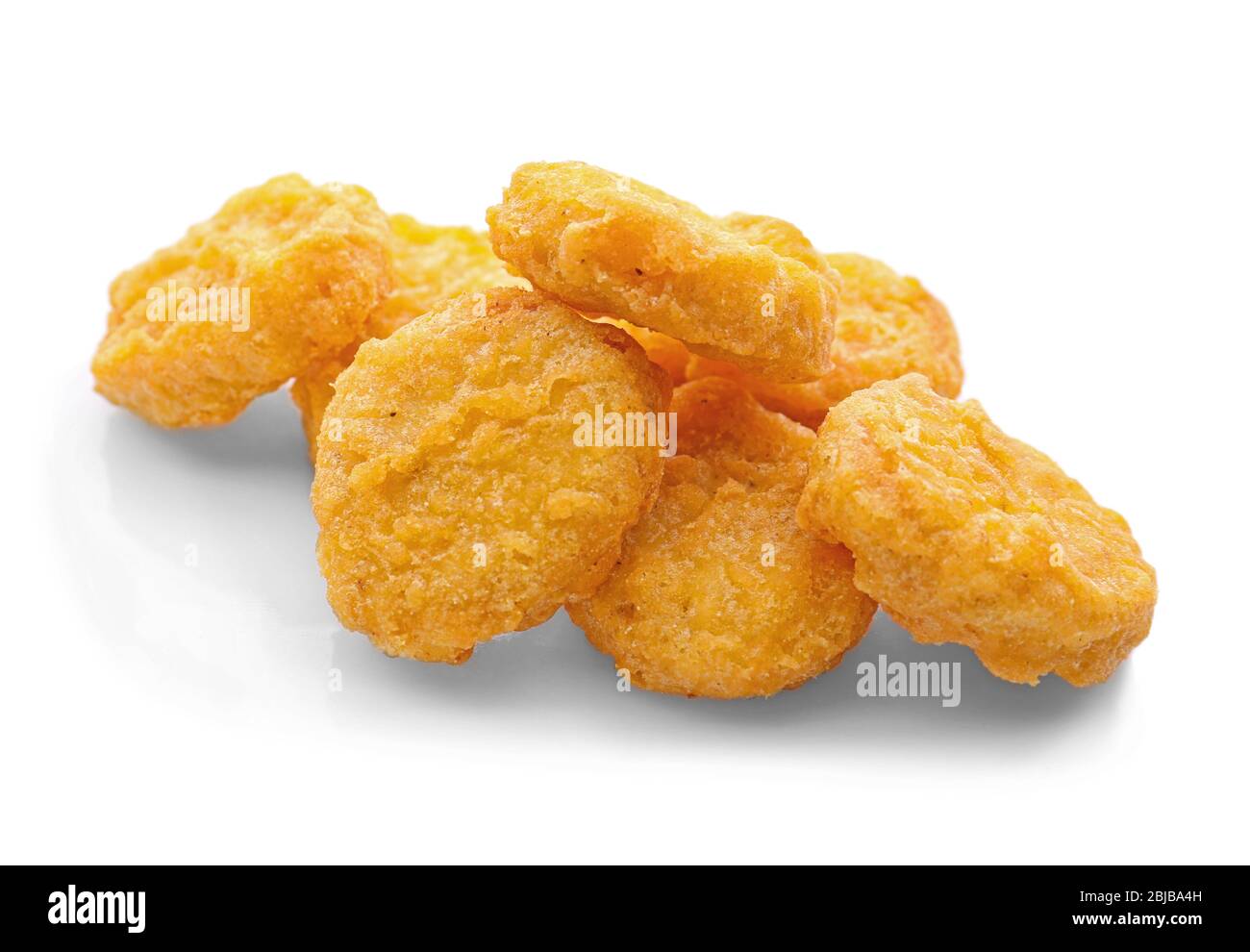 Tasty chicken nuggets, isolated on white Stock Photo - Alamy