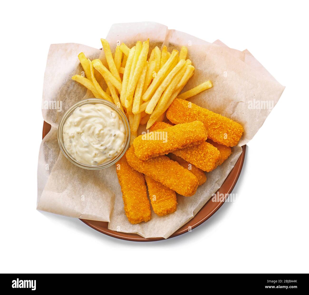 Tasty fish nuggets with fries and sauce on plate, isolated on white ...