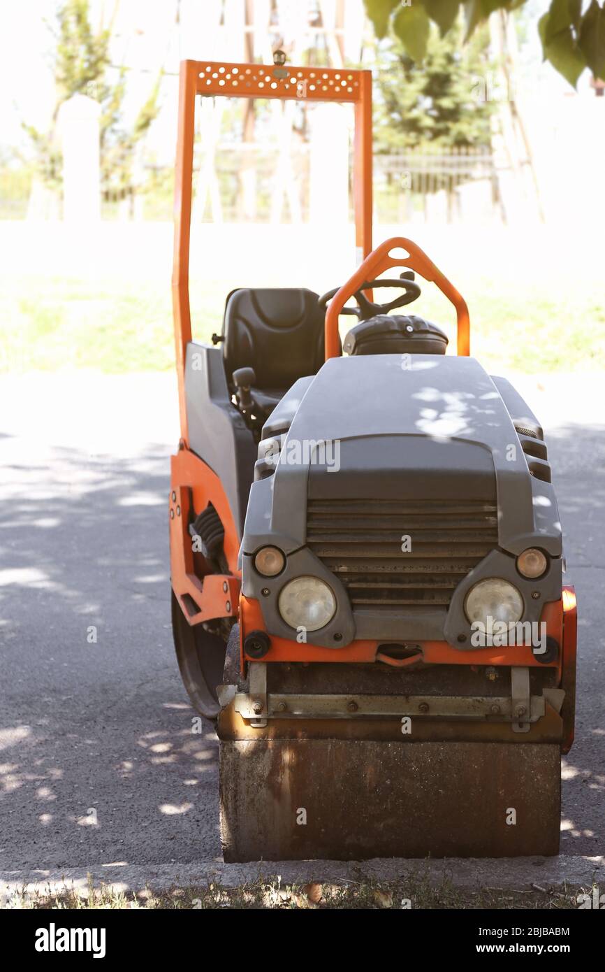 Road roller on city road Stock Photo - Alamy