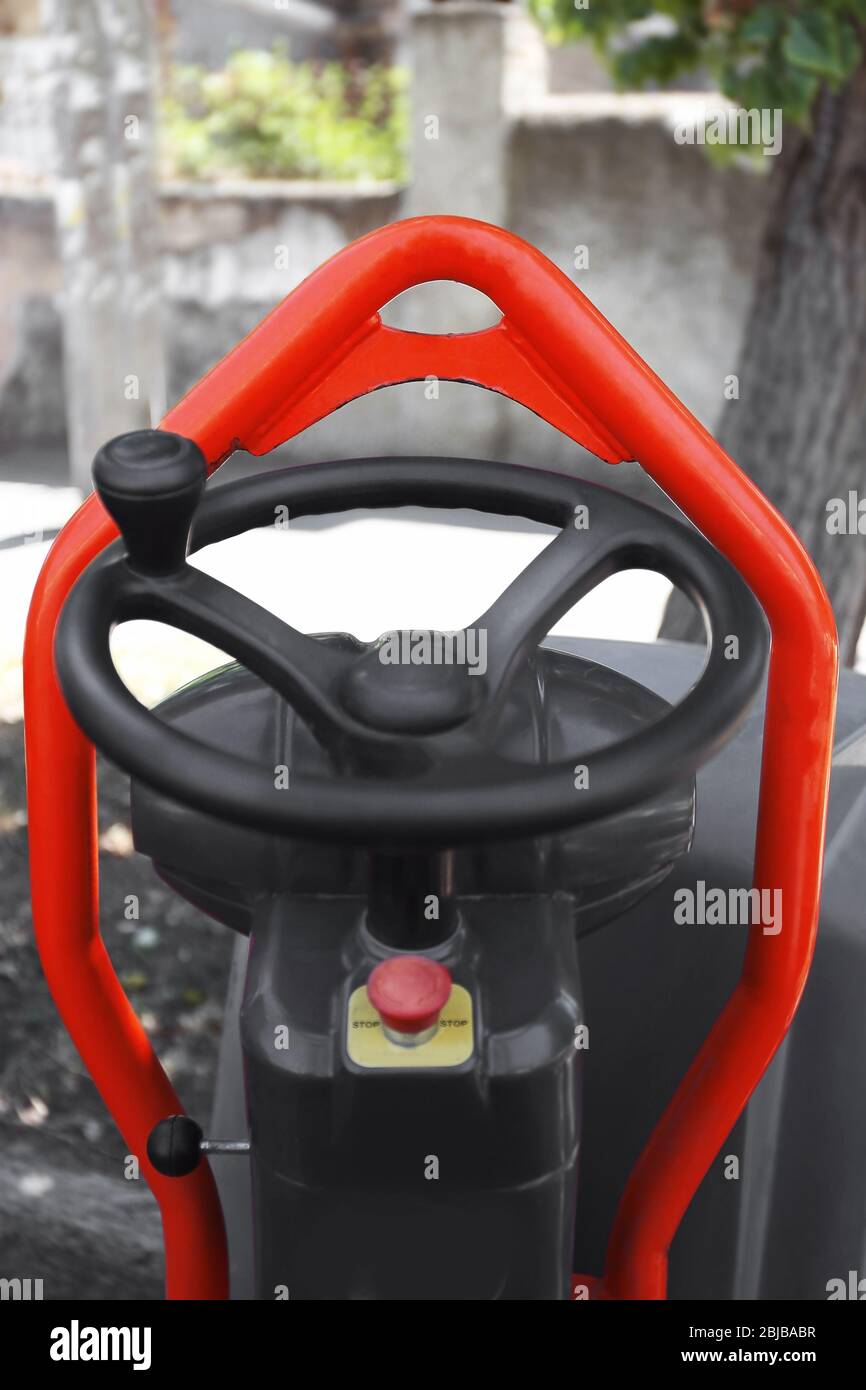 Steering wheel of road roller, closeup Stock Photo - Alamy