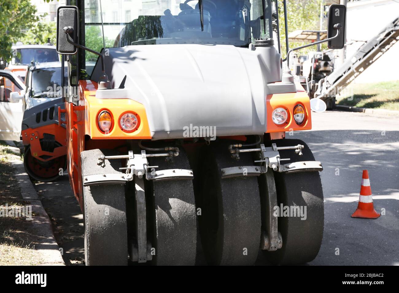 Road roller on city road Stock Photo - Alamy