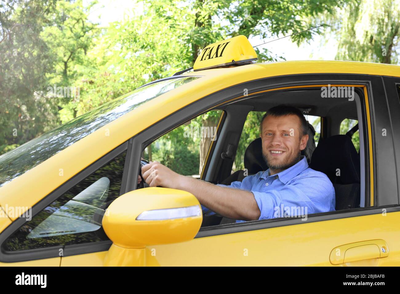 Taxi cab driver steering wheel hi-res stock photography and images - Alamy