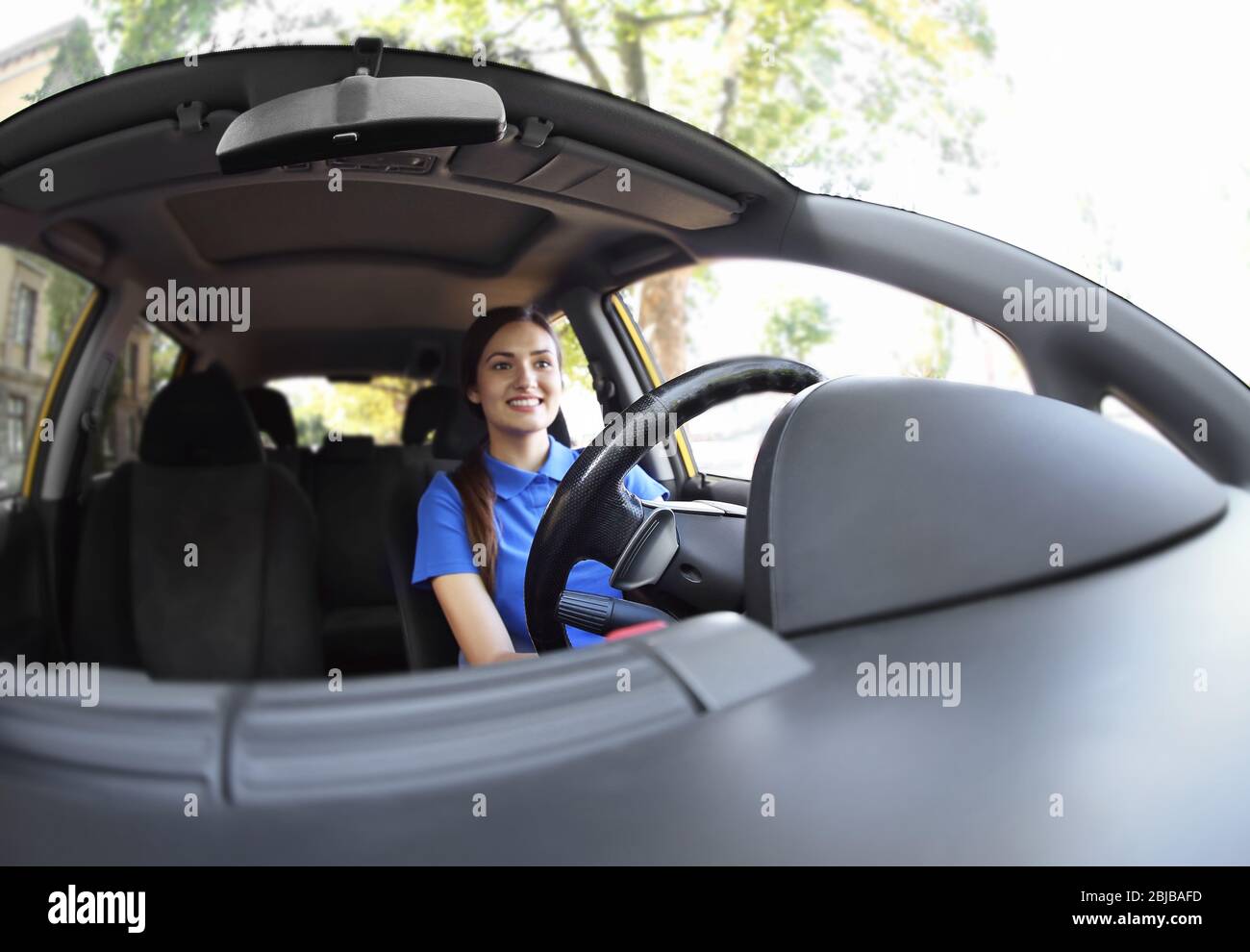 Beautiful woman driving car Stock Photo - Alamy
