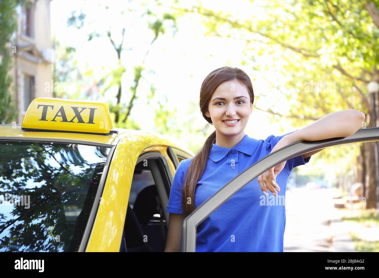 Taxi driver standing hi-res stock photography and images - Alamy