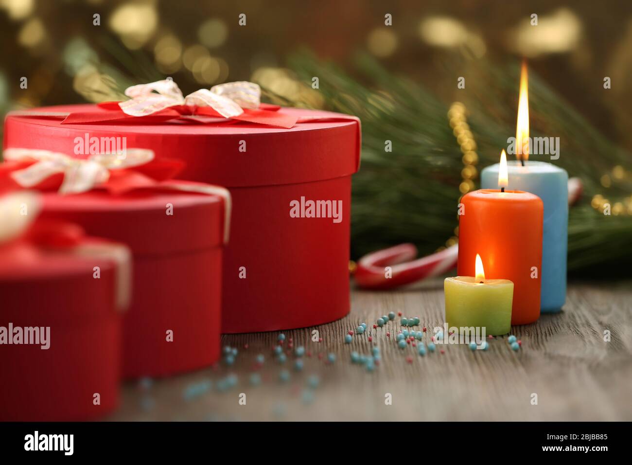 Christmas gift boxes on table Stock Photo - Alamy