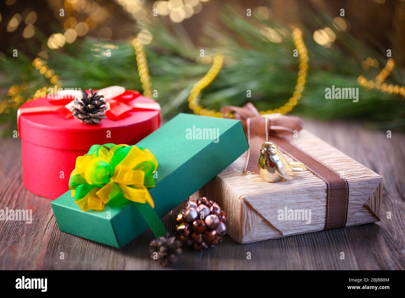 Christmas gift boxes on table Stock Photo - Alamy