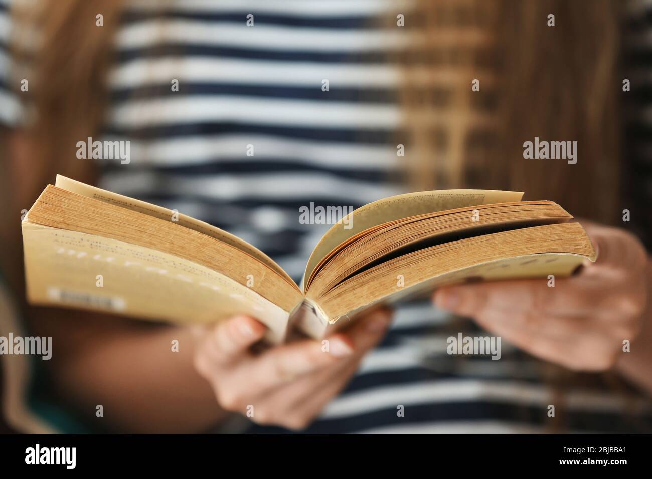 Hands closing book hi-res stock photography and images - Alamy