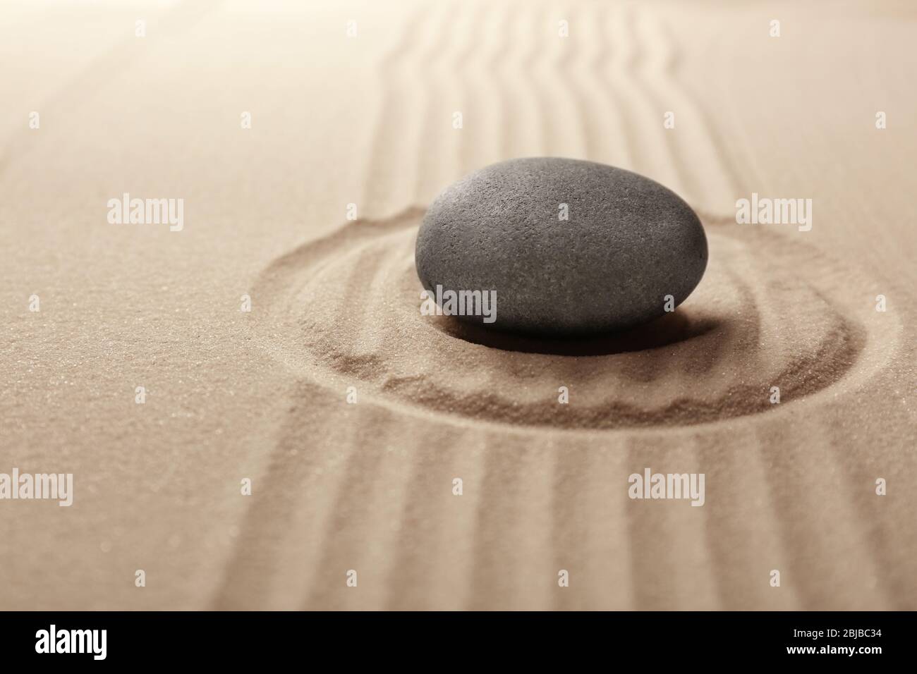 Japanese Zen garden. Pebble on a sand Stock Photo - Alamy