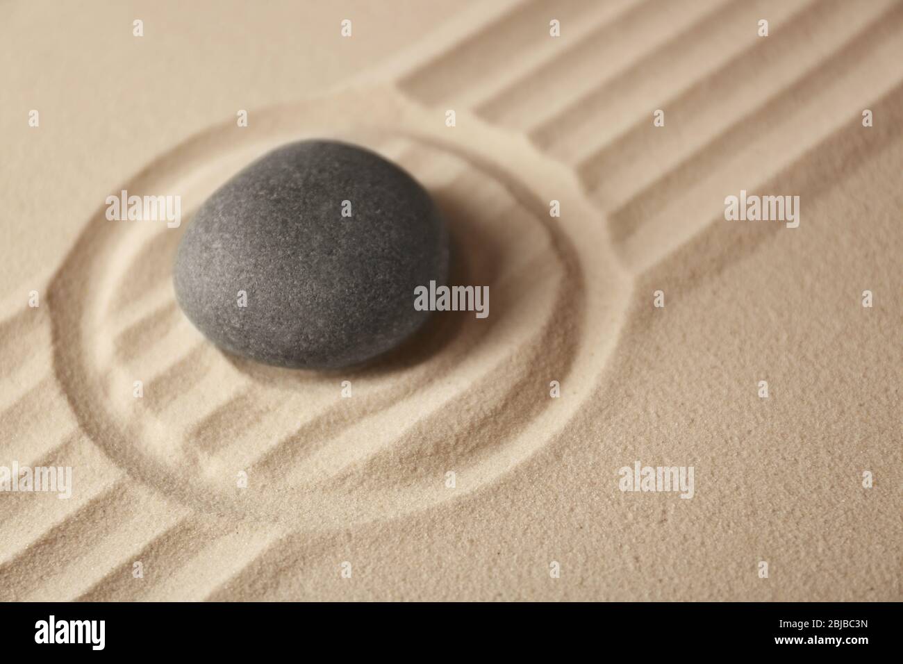 Japanese Zen garden. Pebble on a sand Stock Photo - Alamy