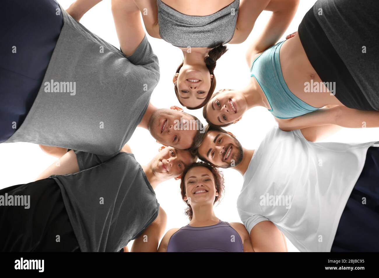 Team work concept. Group of people standing head to head Stock Photo ...