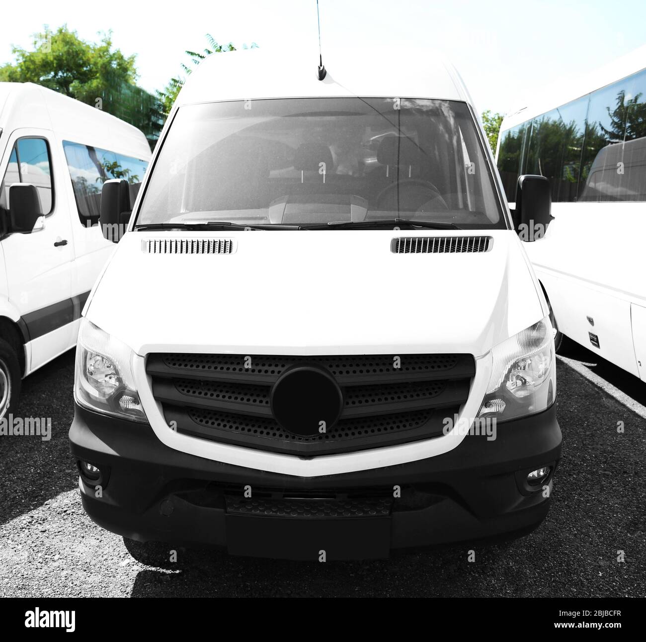 Parked buses in a row Stock Photo - Alamy