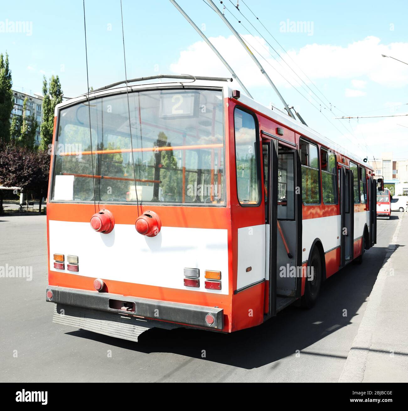 Trolley bus on a road Stock Photo - Alamy