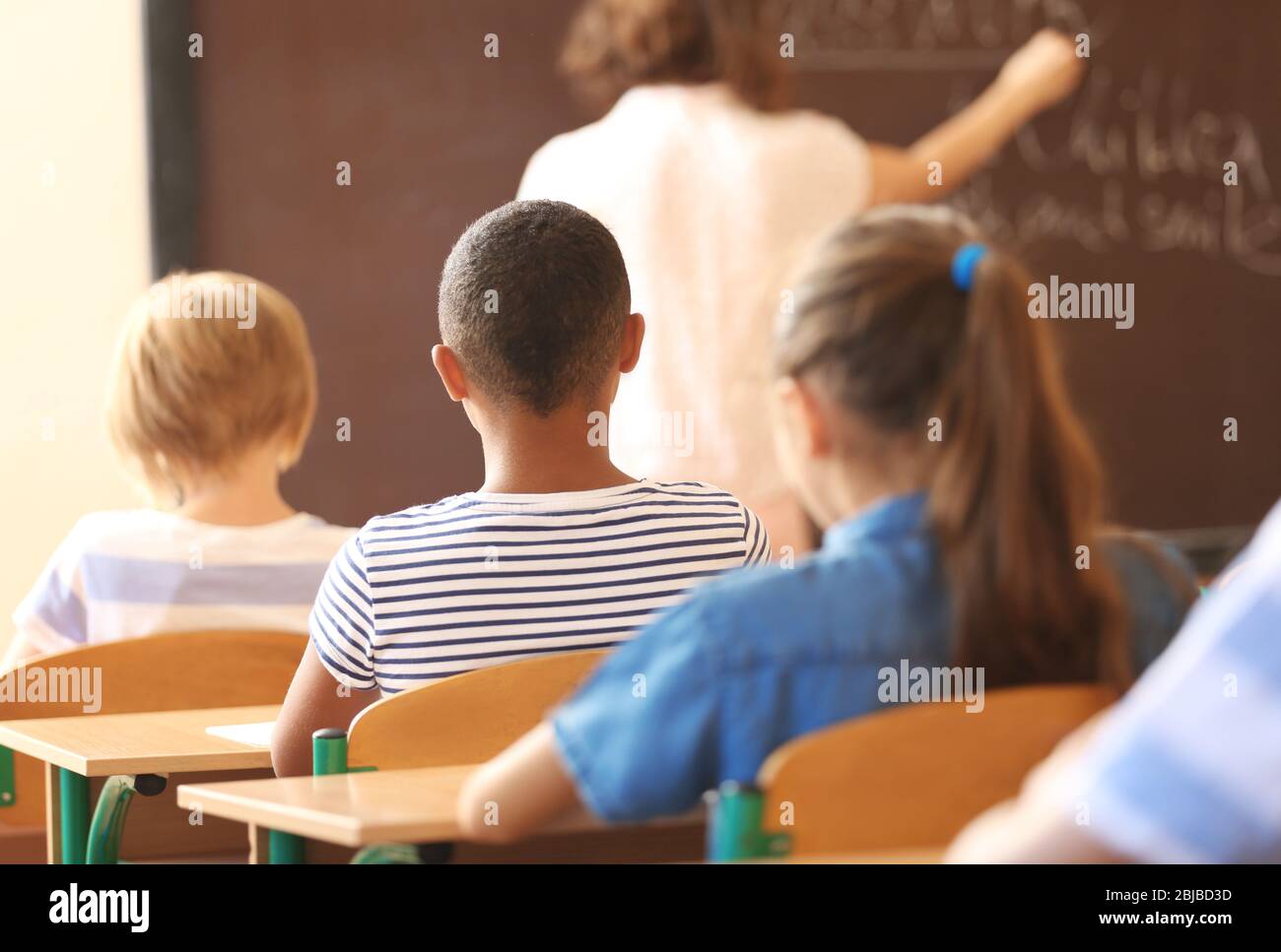 Kids in classroom Stock Photo - Alamy
