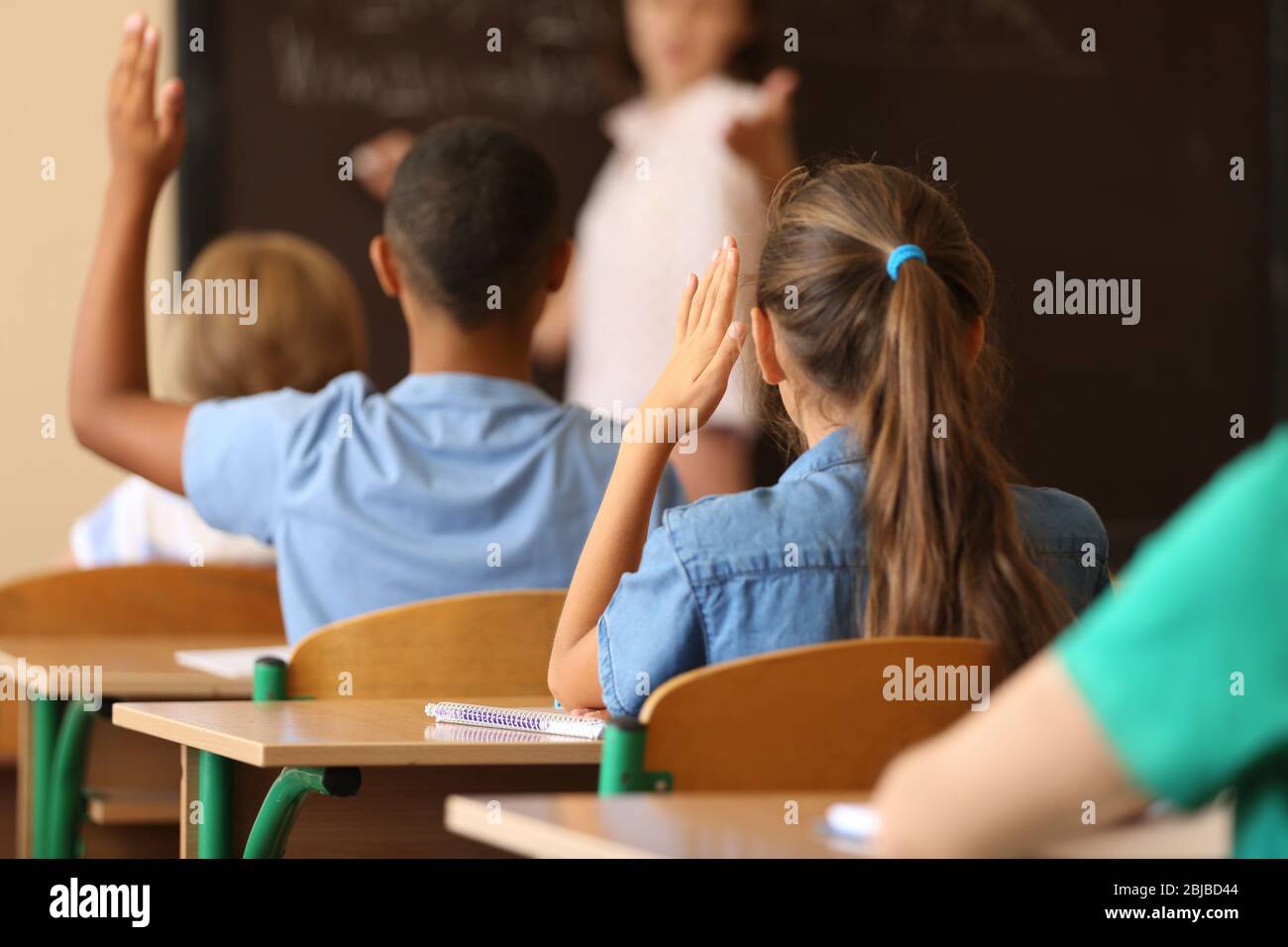 Kids in classroom Stock Photo - Alamy