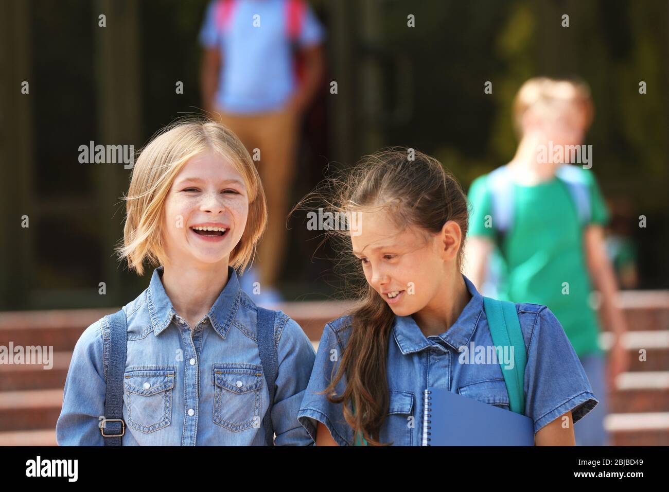 Cute kids standing hi-res stock photography and images - Alamy