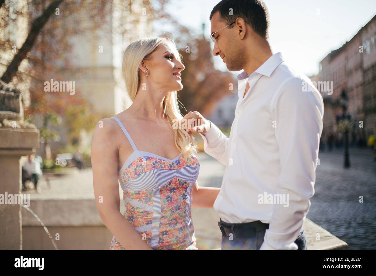 woman with her husband walking around the city, dressed neatly Stock ...
