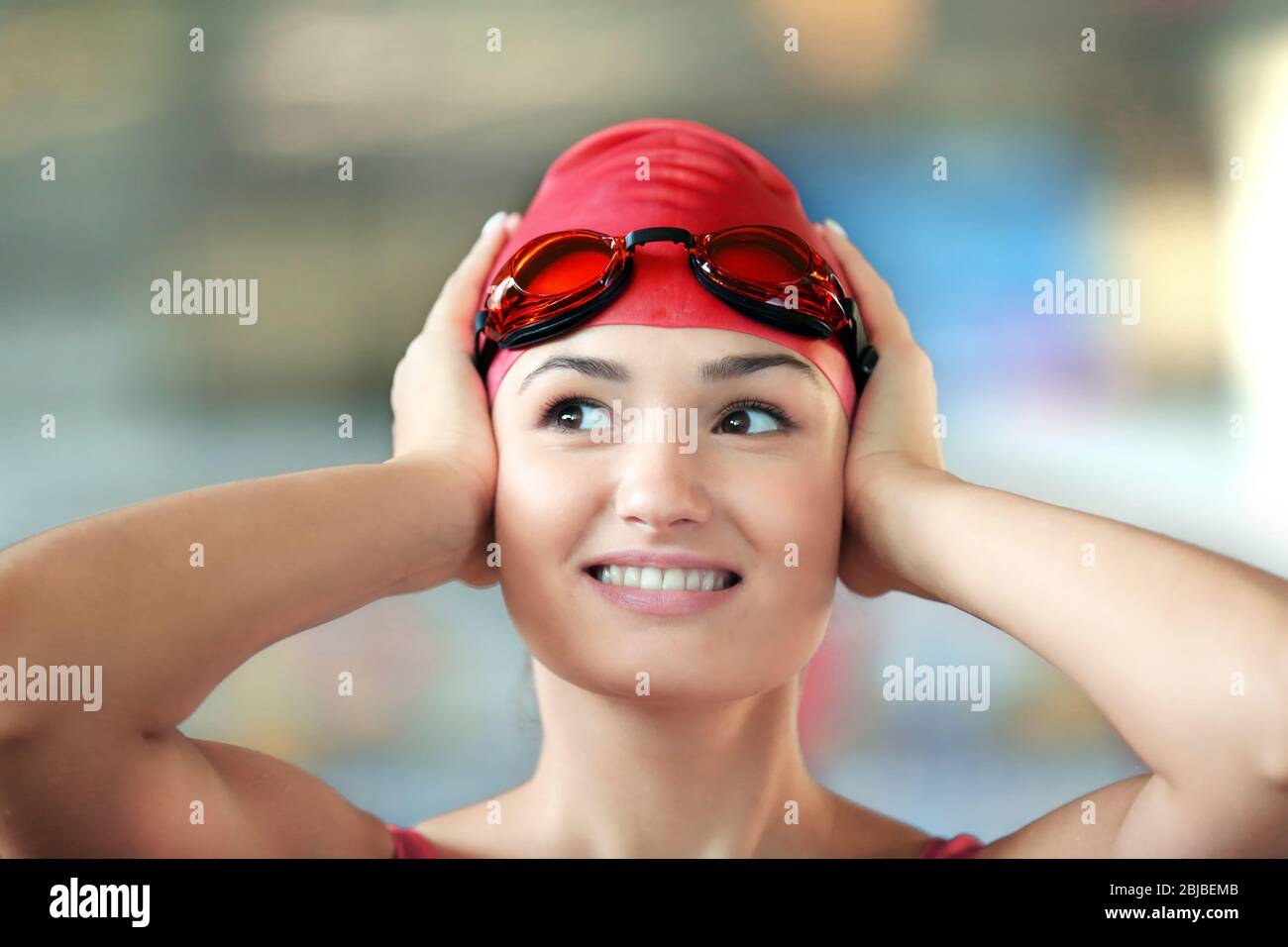 Girl in swimsuit wearing blue hi-res stock photography and images - Alamy