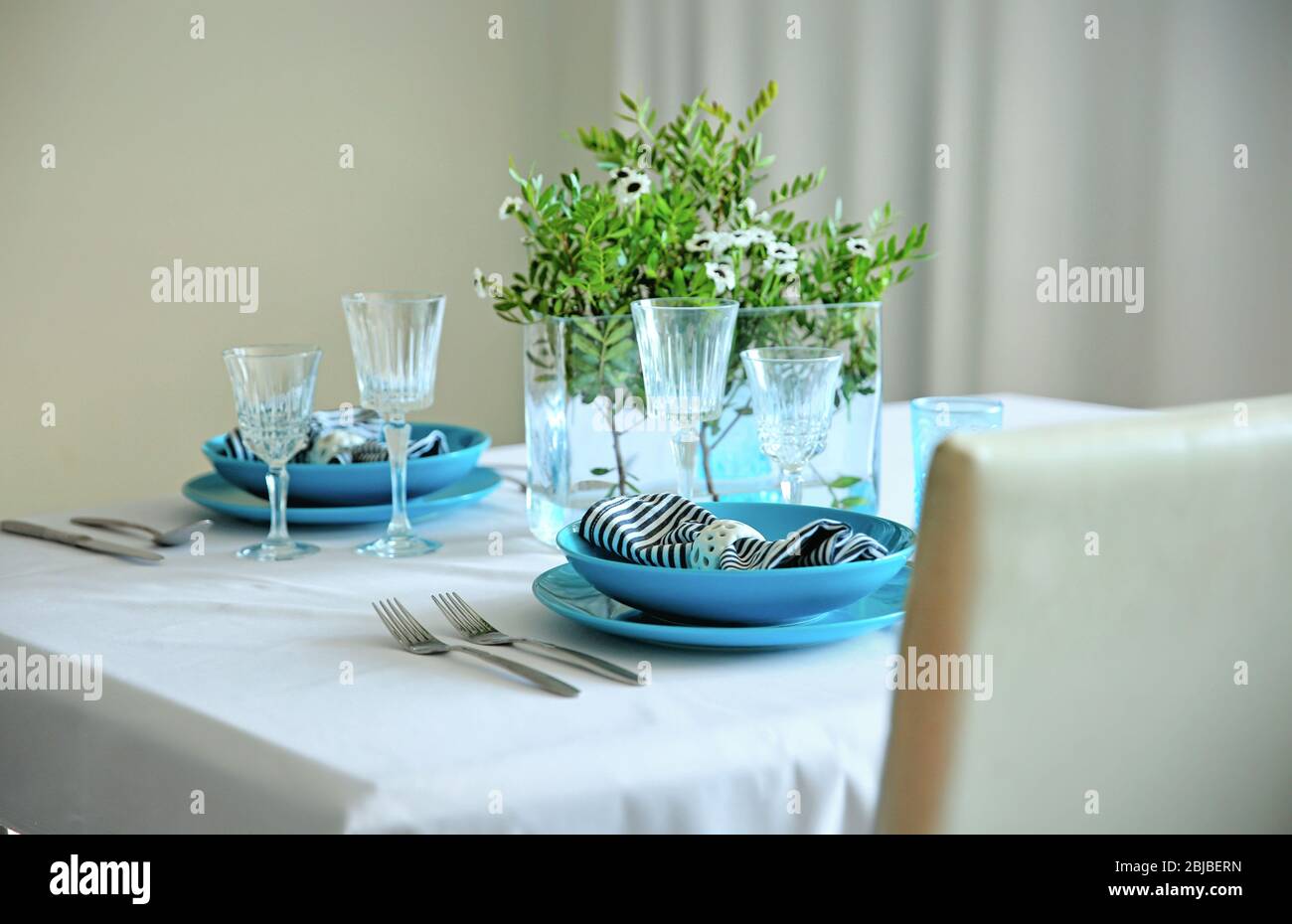 Beautiful table setting in cafe Stock Photo - Alamy