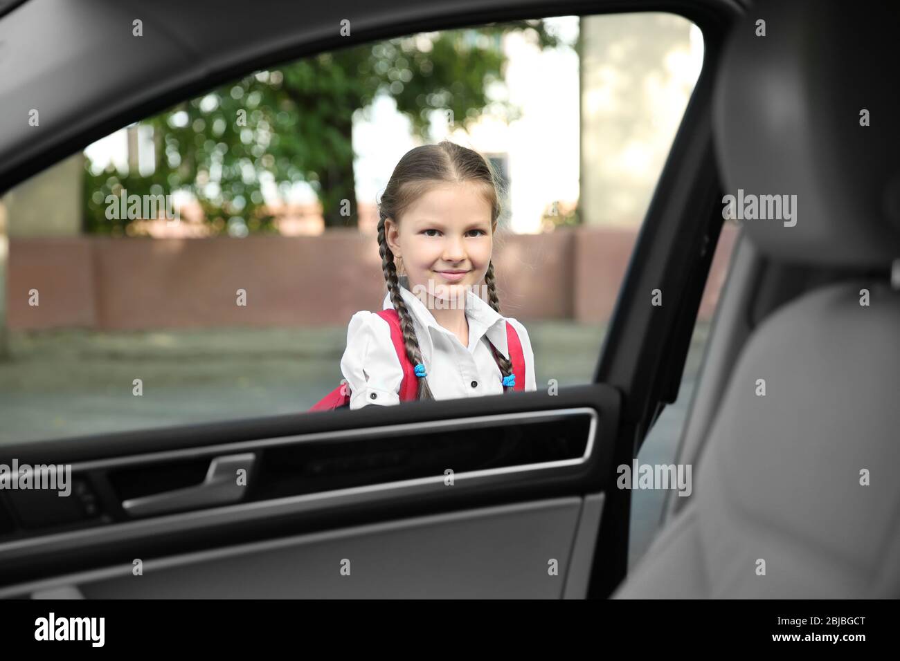 Children in car school uniform hi-res stock photography and images - Alamy