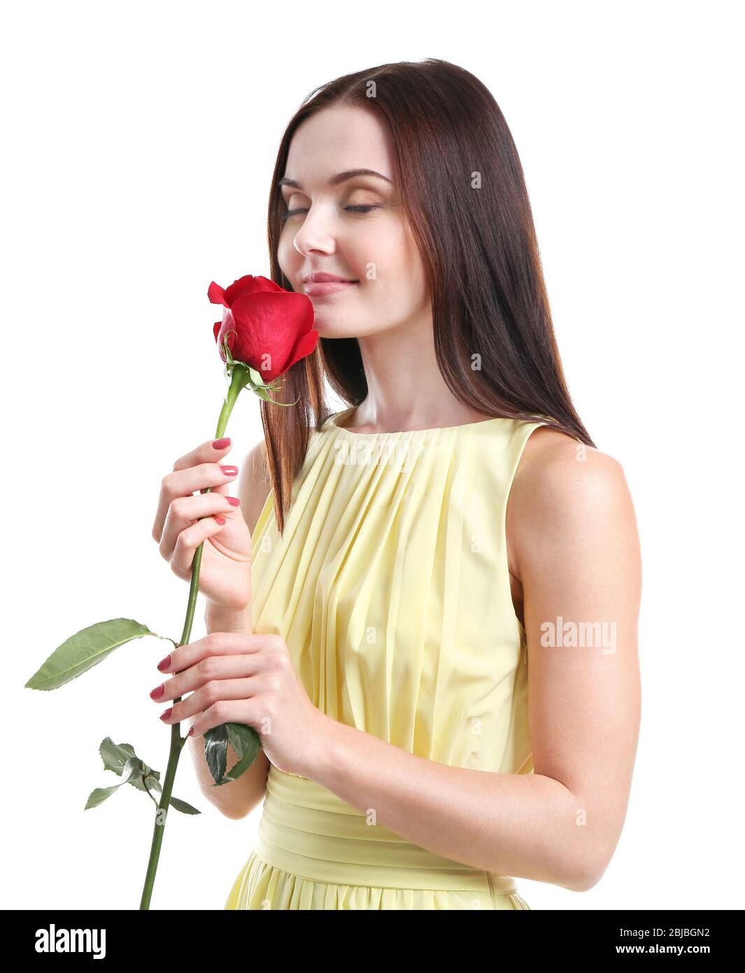 Girl holding red rose on white background Stock Photo - Alamy