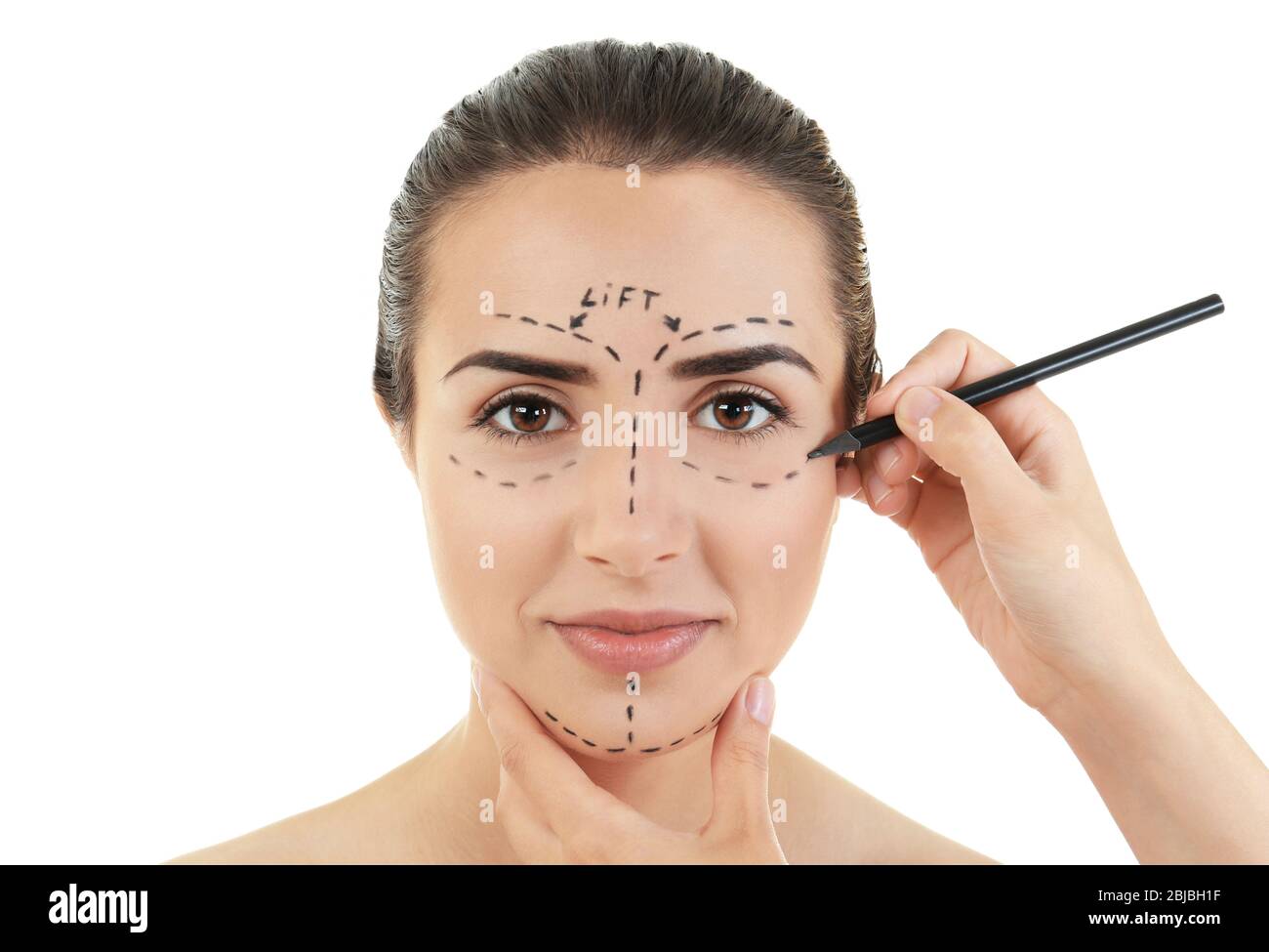 Plastic surgery concept. Hands marking women face Stock Photo - Alamy