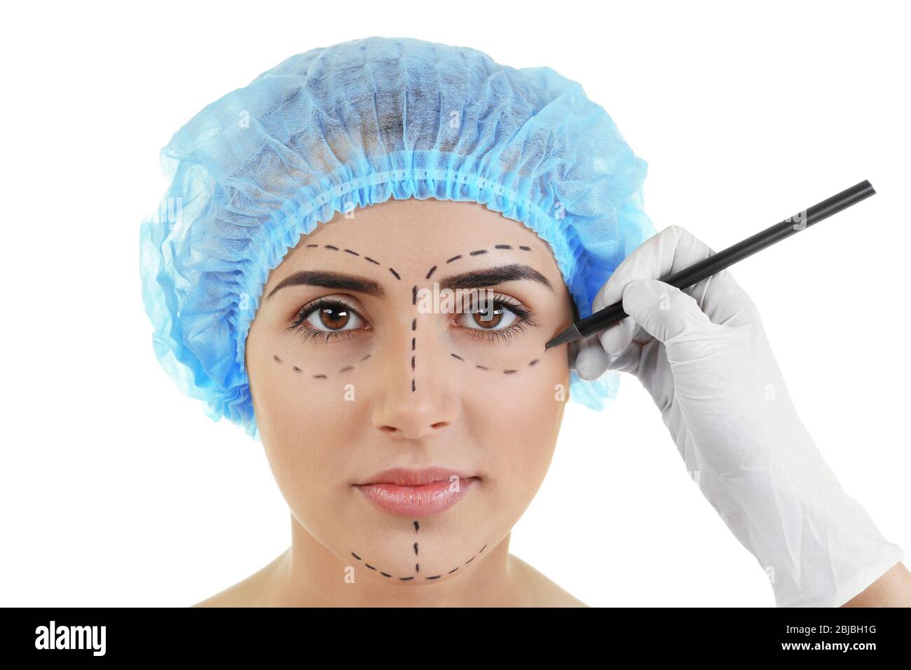 Plastic surgery concept. Hand in glove marking women face Stock Photo ...