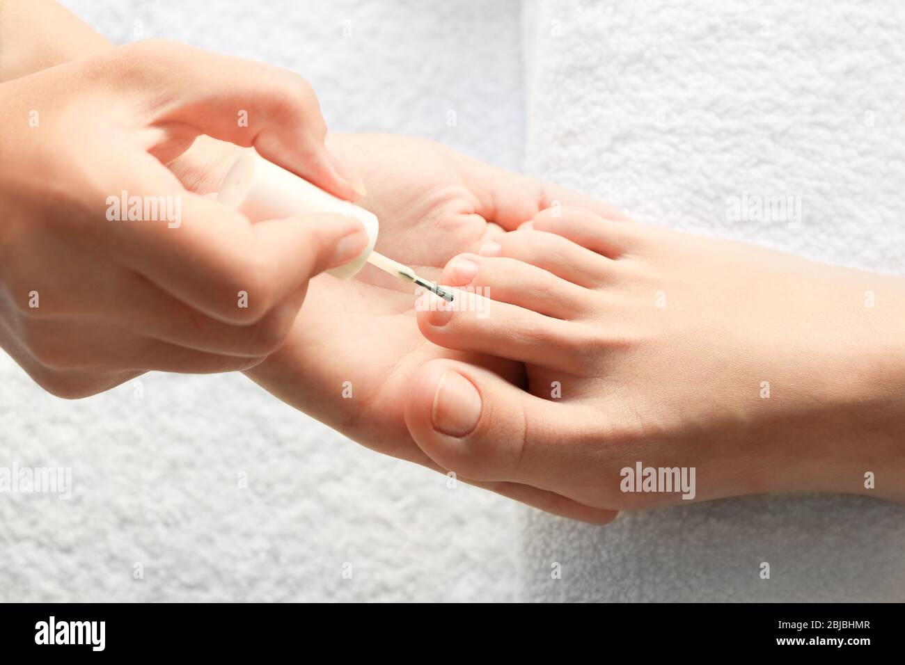 Female legs at pedicure salon Stock Photo - Alamy