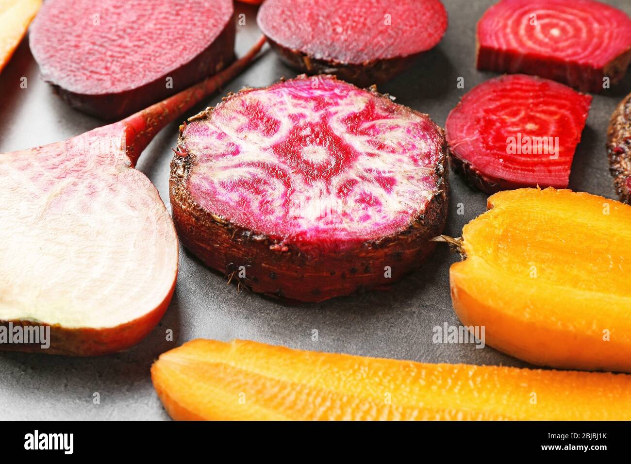 Fresh young sliced beets and carrot, closeup Stock Photo - Alamy