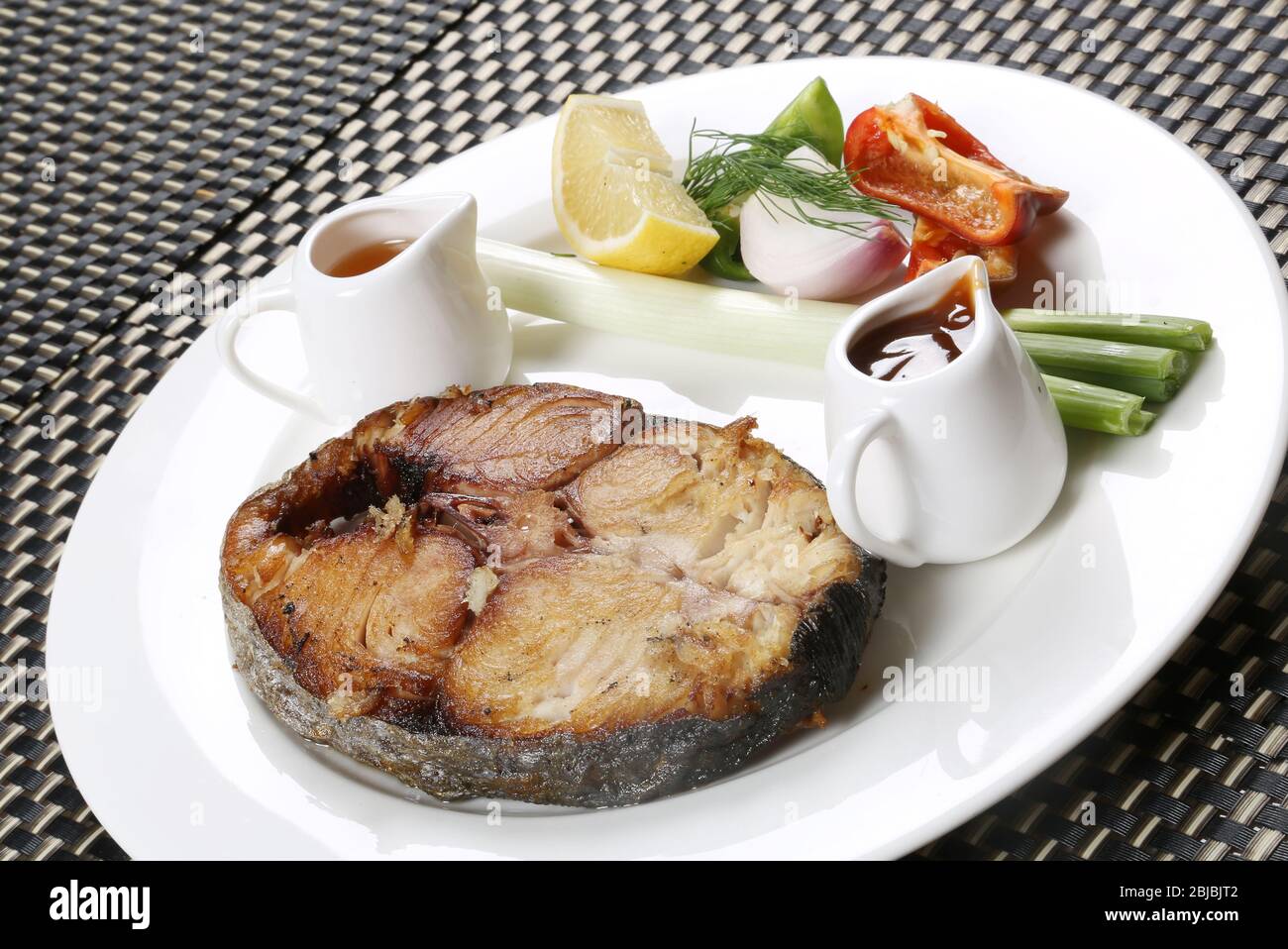 Fried Fish slice with Sauces Stock Photo - Alamy