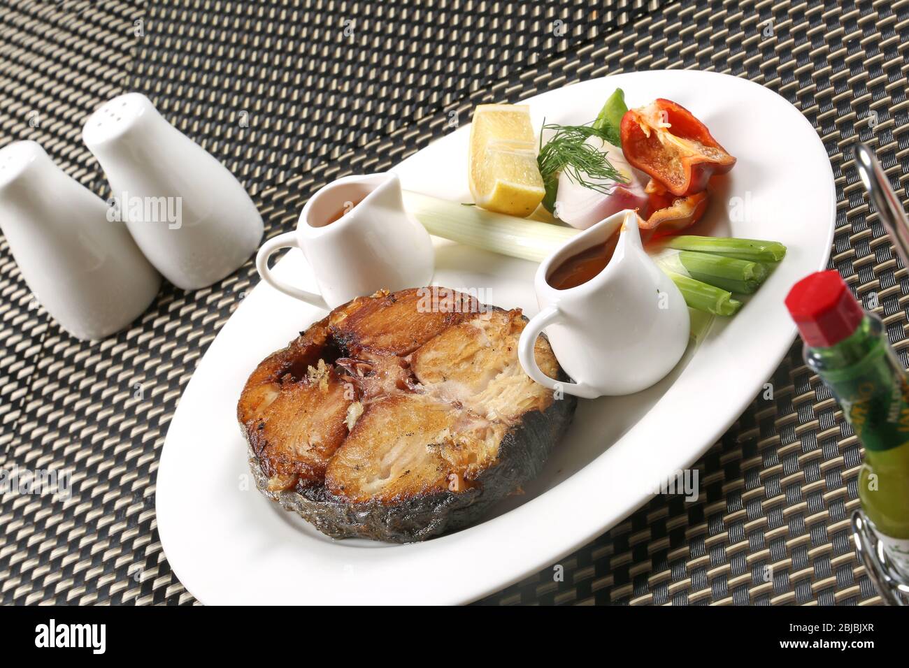 Fried Fish slice with Sauces Stock Photo - Alamy