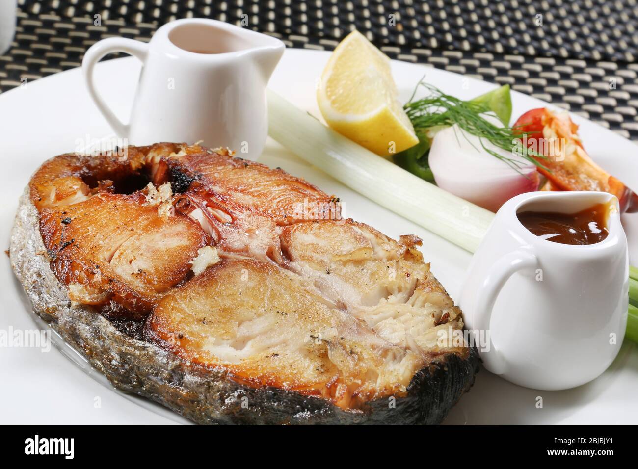 Fried Fish slice with Sauces Stock Photo - Alamy