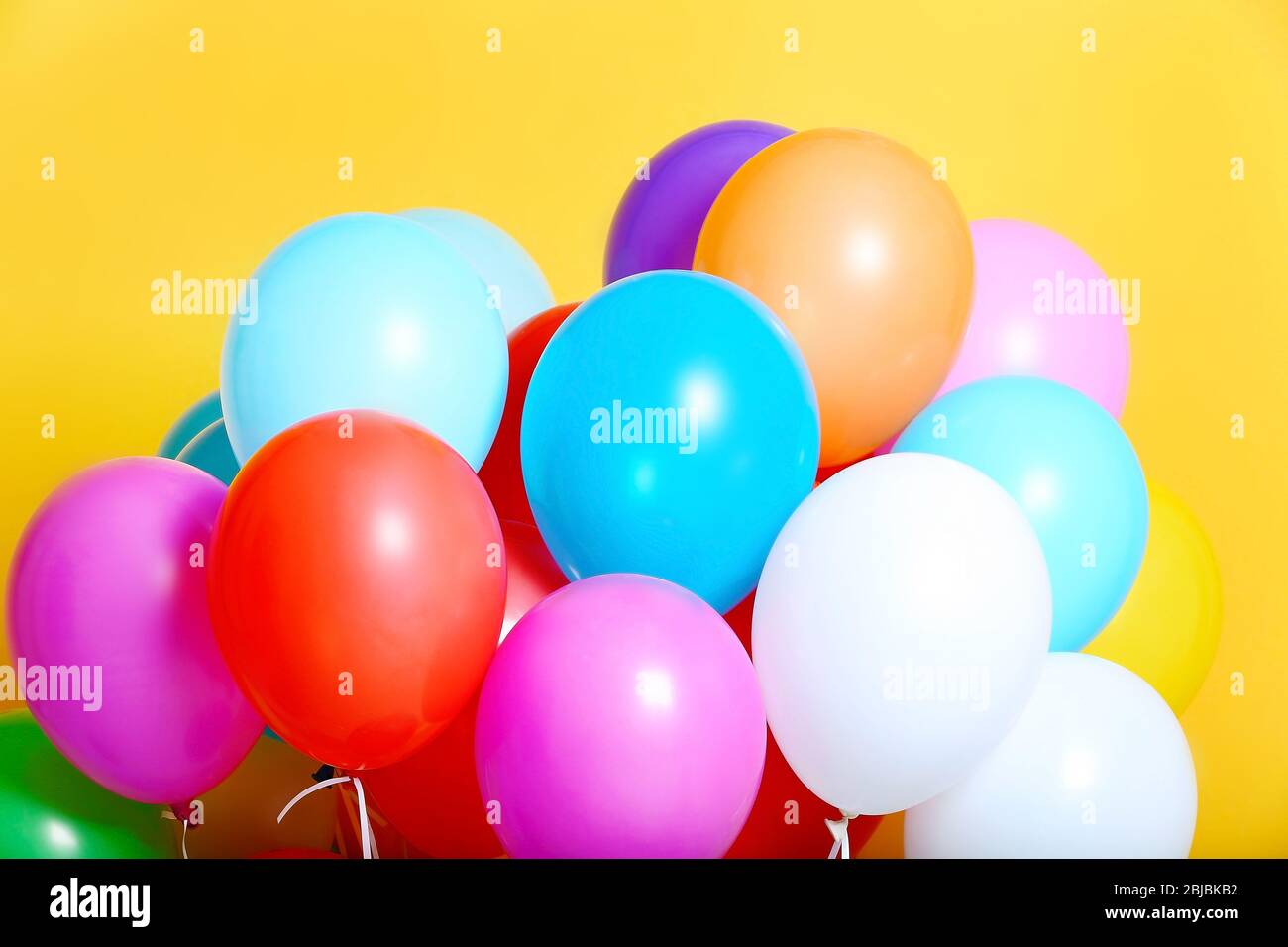 Colorful birthday balloons, closeup Stock Photo - Alamy