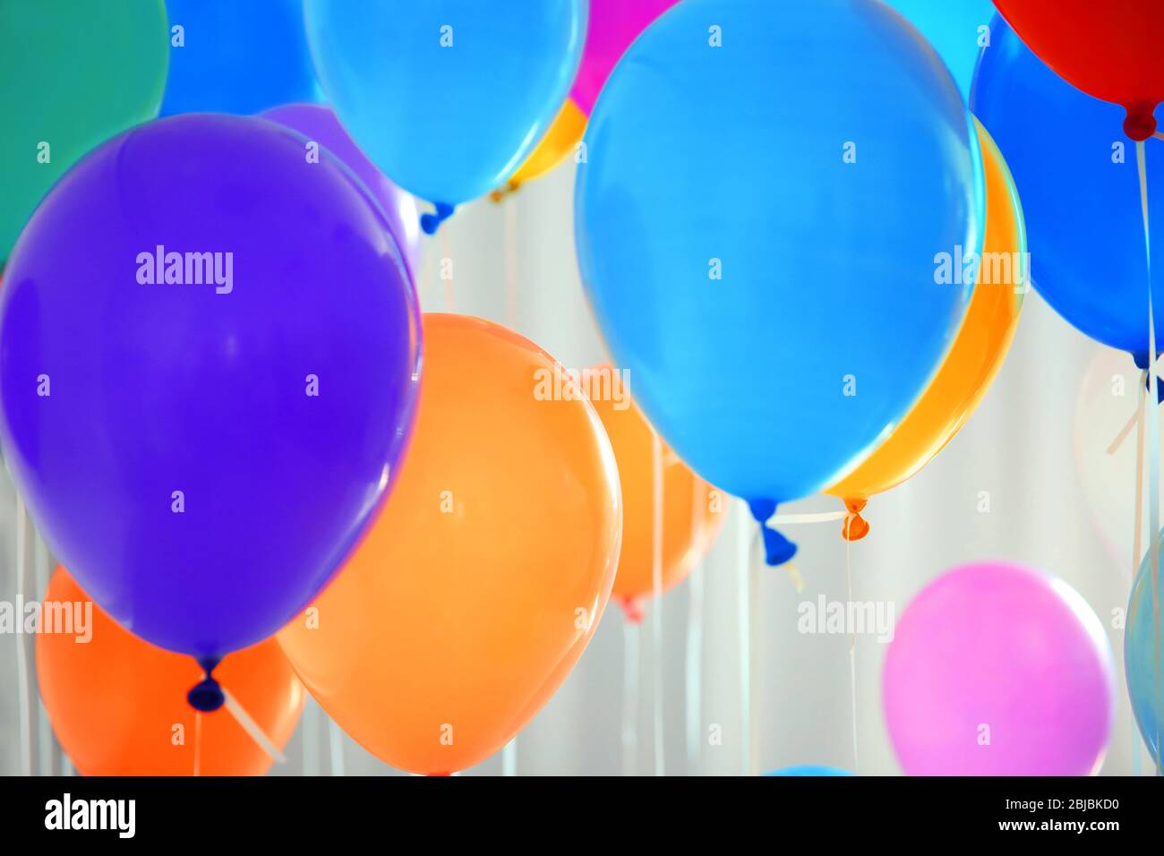 Colorful birthday balloons, closeup Stock Photo - Alamy