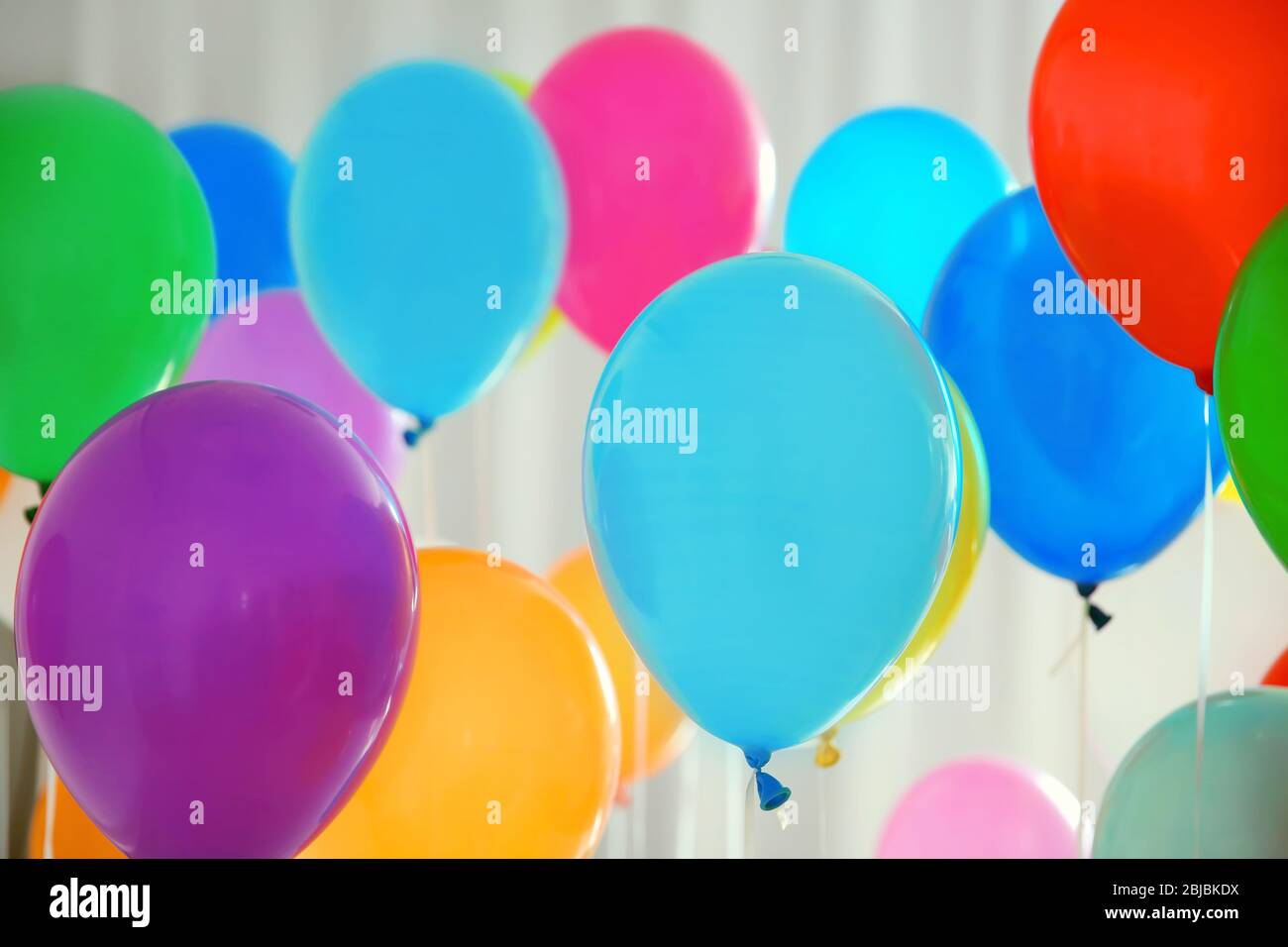 Colorful birthday balloons, closeup Stock Photo - Alamy