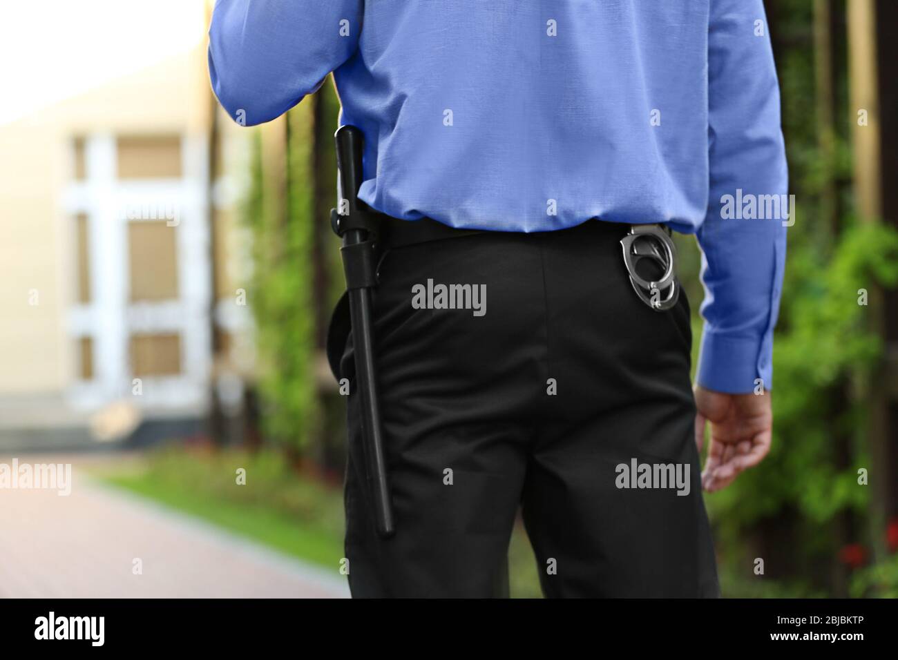 Male security guard protects hi-res stock photography and images - Alamy