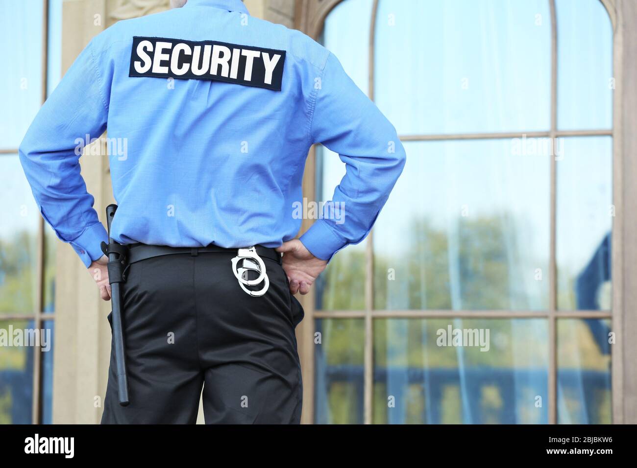 Male security guard protects hi-res stock photography and images - Alamy