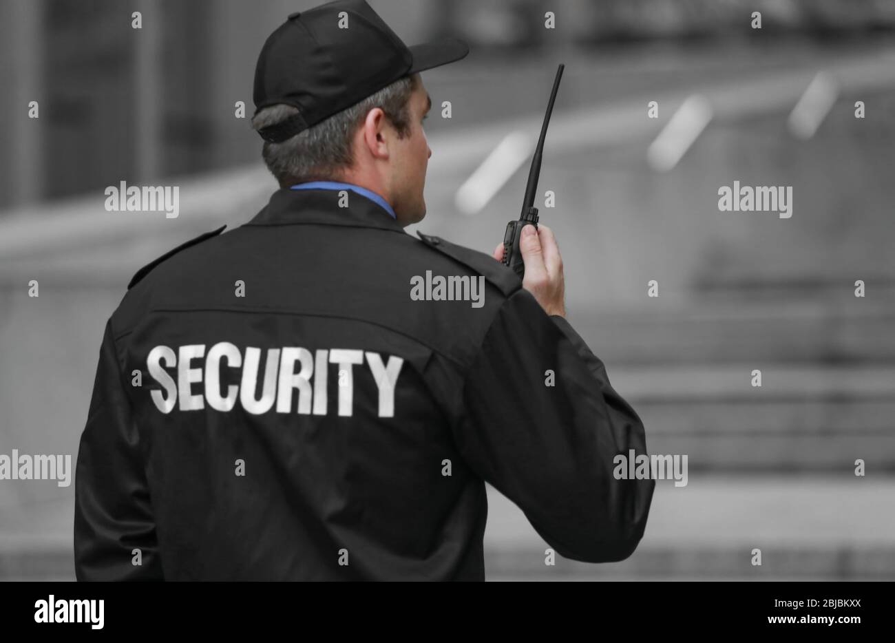 Male security guard, outdoor Stock Photo - Alamy