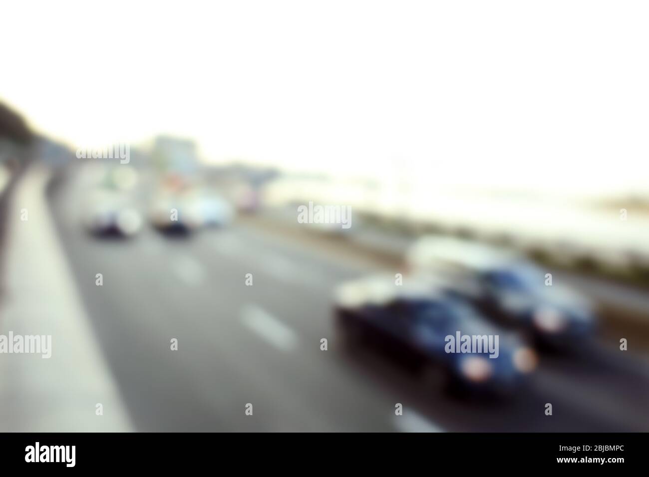 Blurred view of road with cars Stock Photo - Alamy
