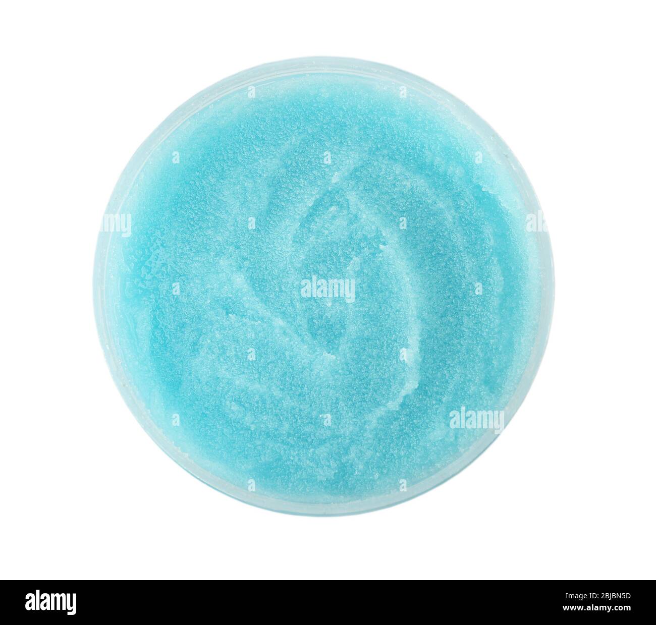 Natural scrub in container on white background Stock Photo - Alamy