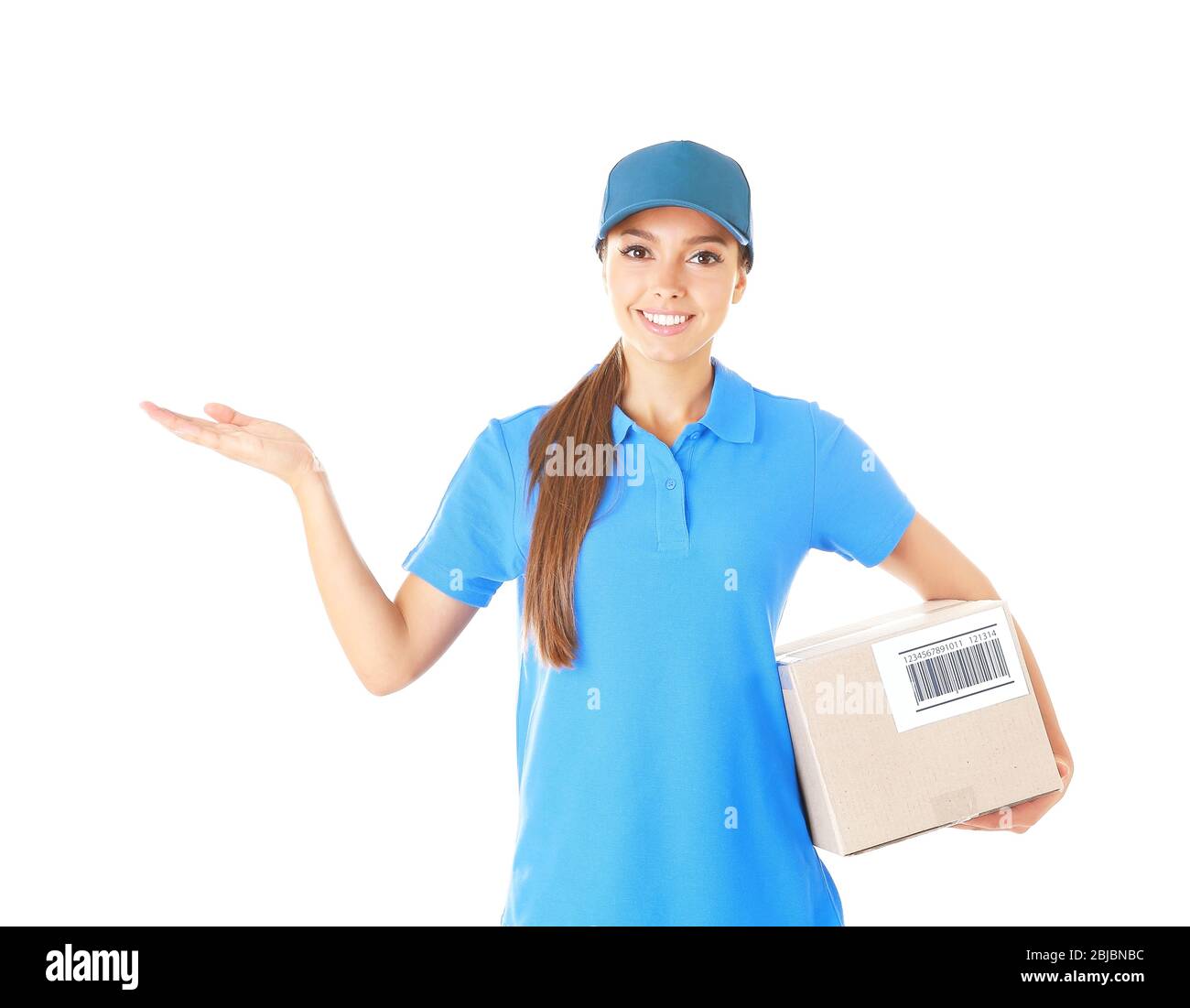 Delivery woman in uniform with parcel on white background Stock Photo ...