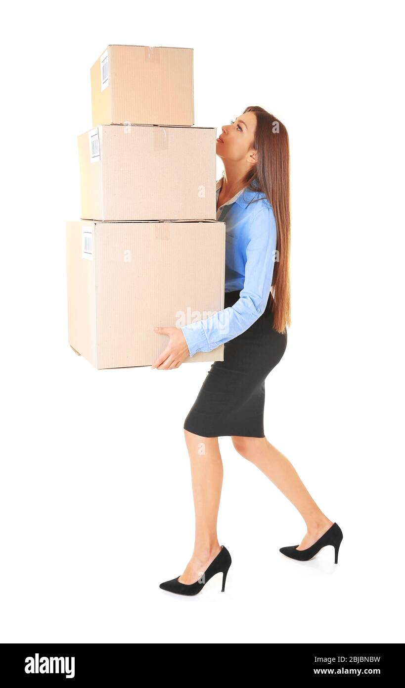 Beautiful businesswoman holding heavy boxes on white background Stock ...