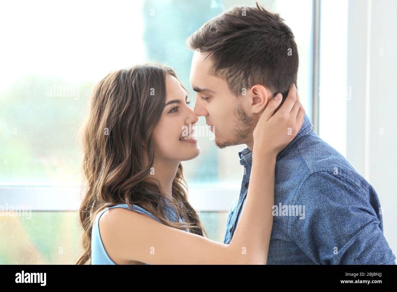 Beautiful couple at home Stock Photo - Alamy