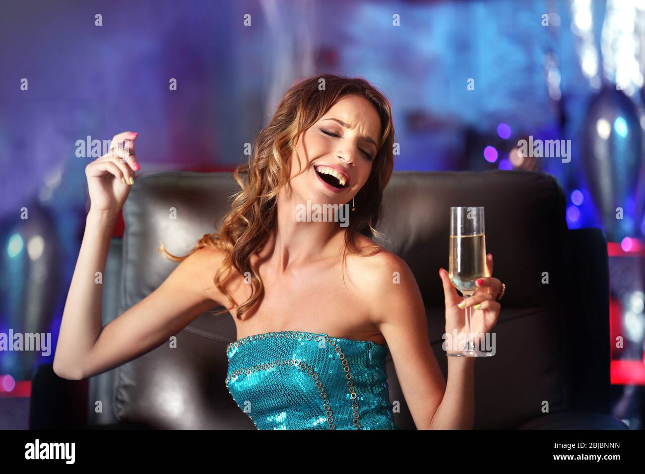 Beautiful girl in nightclub Stock Photo - Alamy