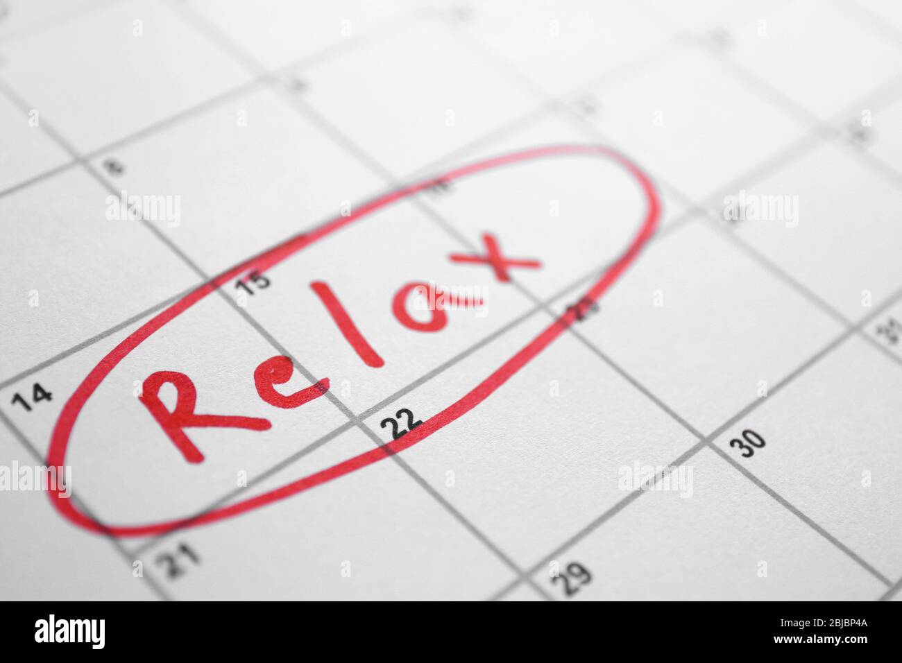 Word "relax" written in day planner, close up view Stock Photo - Alamy