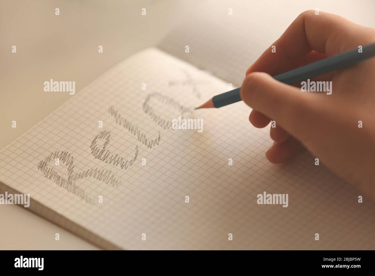 Female hand writing word "relax" in notebook, close up view Stock Photo ...