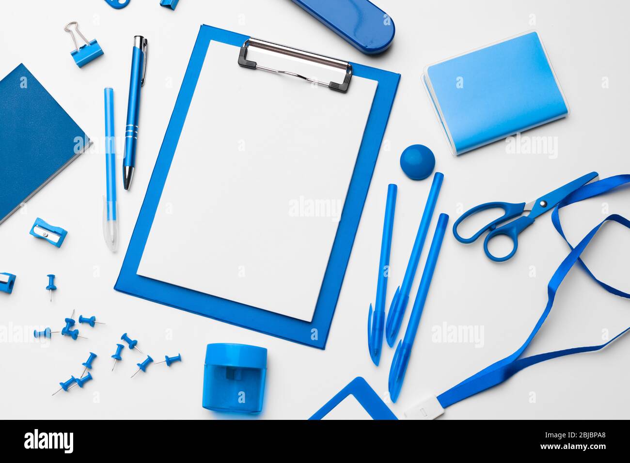 blue color stationery set as pattern with copy space on white ...