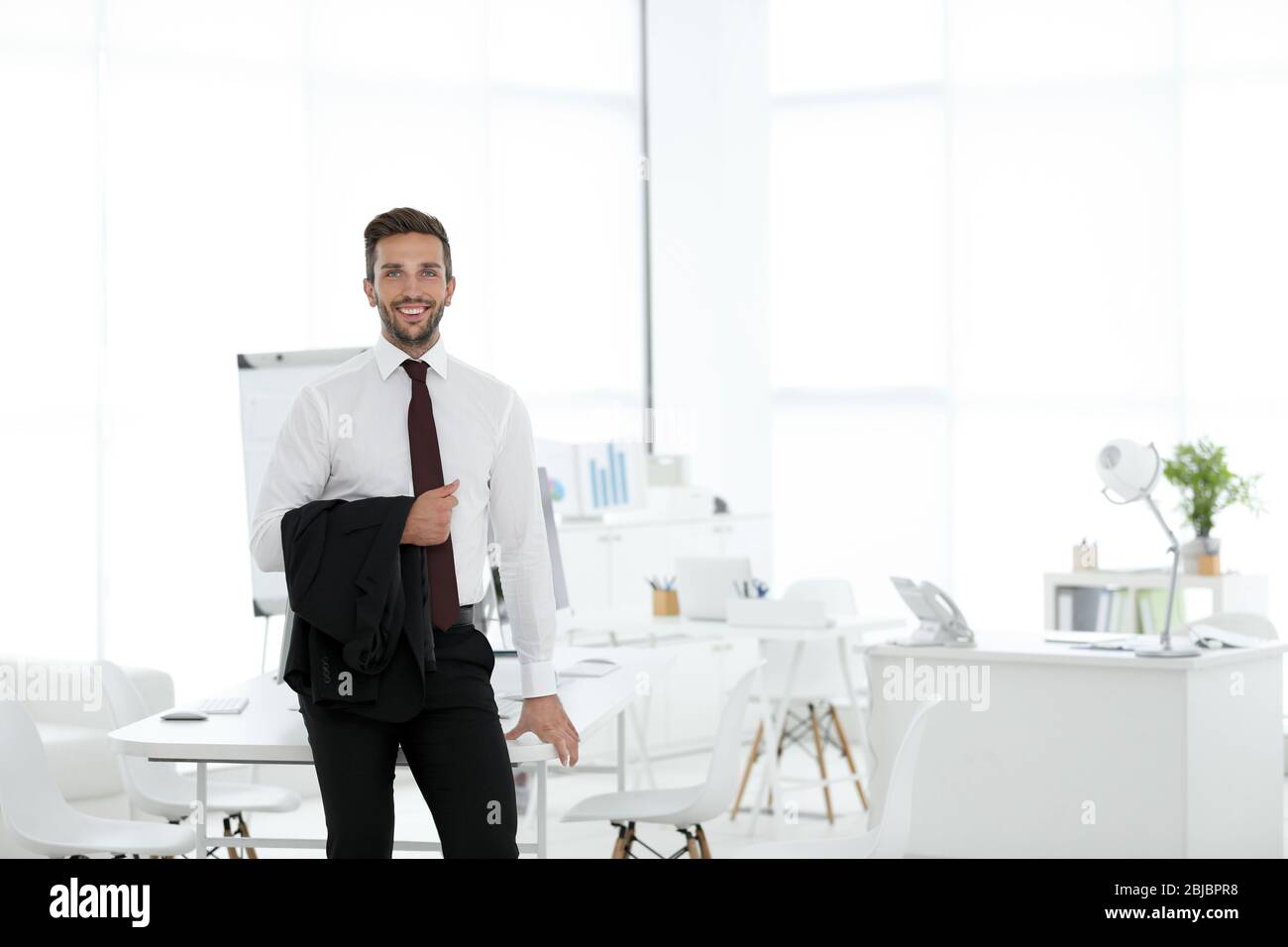 Business man at modern office Stock Photo - Alamy